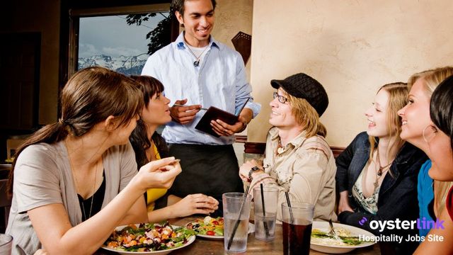 How Many Tables Do Waiters Serve at a Time?